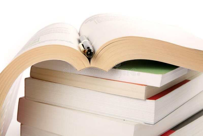Books Stack and pen stock photo. Image of open, volume - 2444642