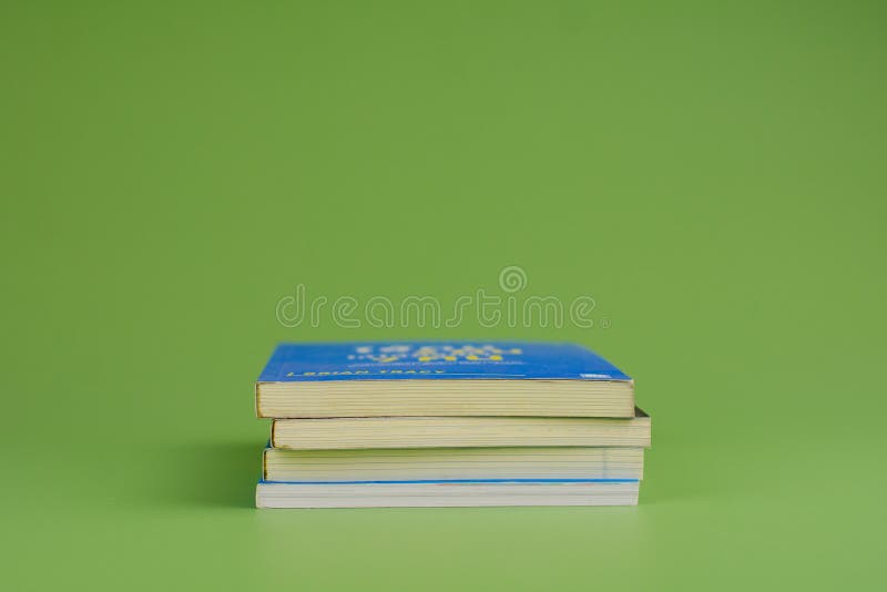 Books. Stack of Books Stacked on Light Green Background. Reading ...
