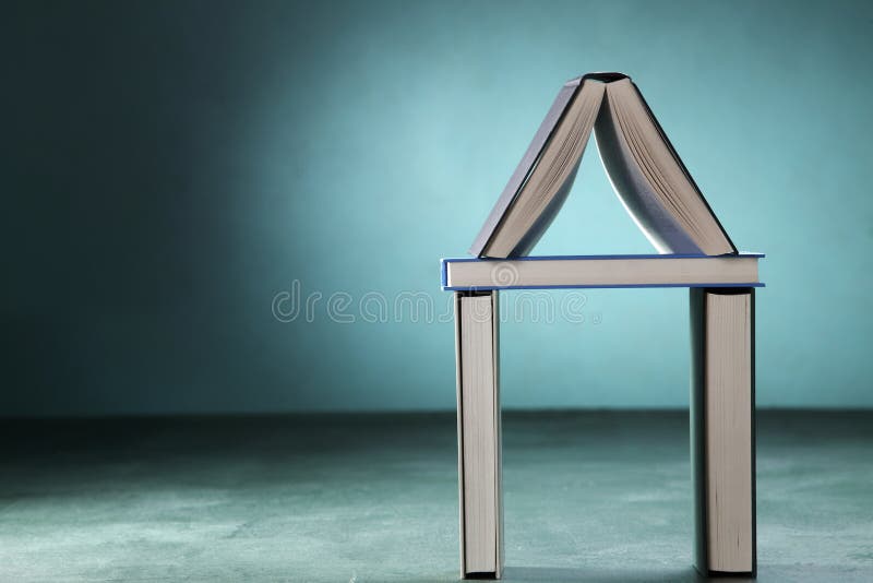 Books Stacked in House Shape Stock Photo - Image of background, stack ...