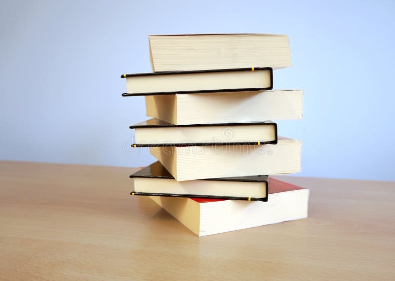 Books Stacked Vertically on the Blank Background Stock Image - Image of ...
