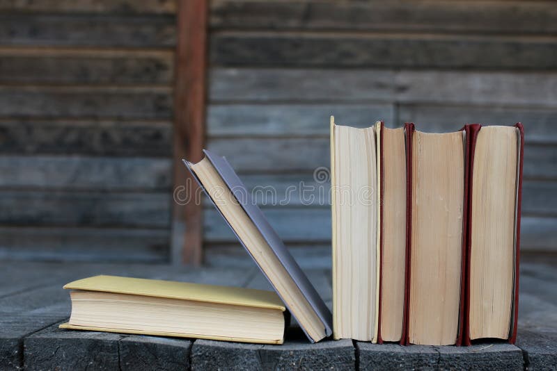 Books standing on a table stock photo. Image of copy - 100478384