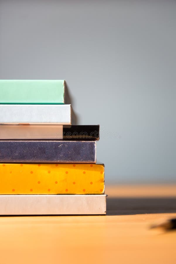 Books on the Table. No Labels, Blank Spine Stock Image - Image of ...