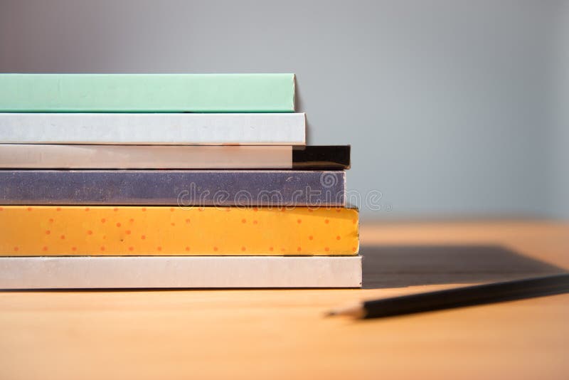 Books on the Table. No Labels, Blank Spine and Pencil Stock Photo ...