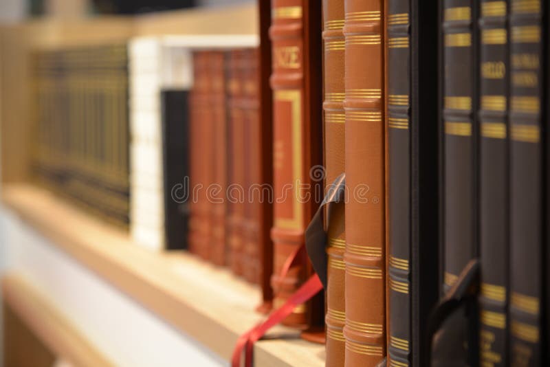 Bookshelf with Row of Classical Leather Hardcover Books Stock Photo ...