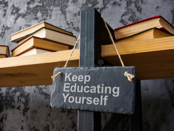 Bookshelf with the Phrase Keep Educating Yourself Symbolizing Lifelong ...