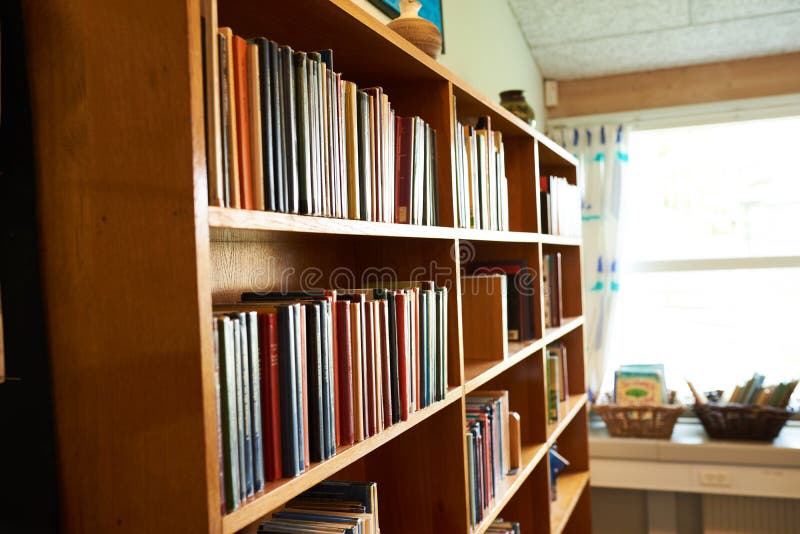 A Bookshelf at a School Library Stock Photo - Image of classroom ...
