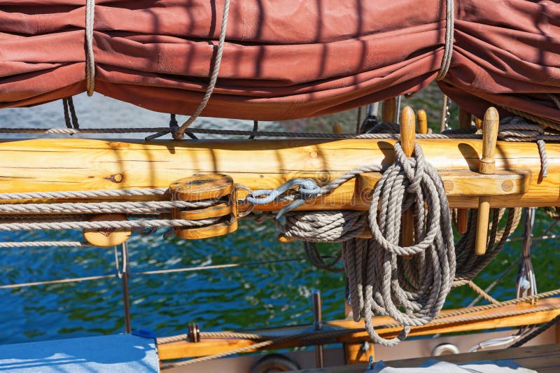 Boom with Blocks and a Red Sail on the Boat Editorial Stock Photo ...