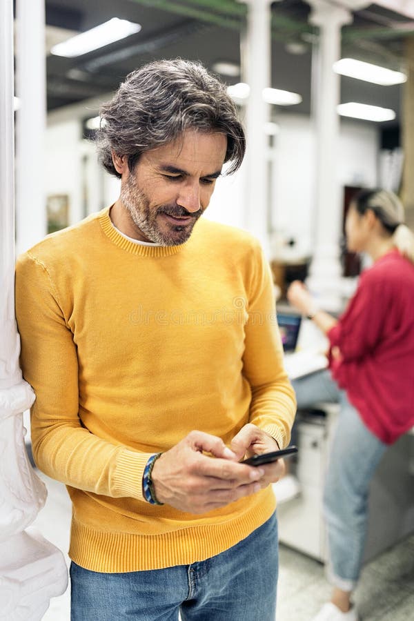 Boomer Office Worker Using Phone Stock Image - Image of boomer, looking ...
