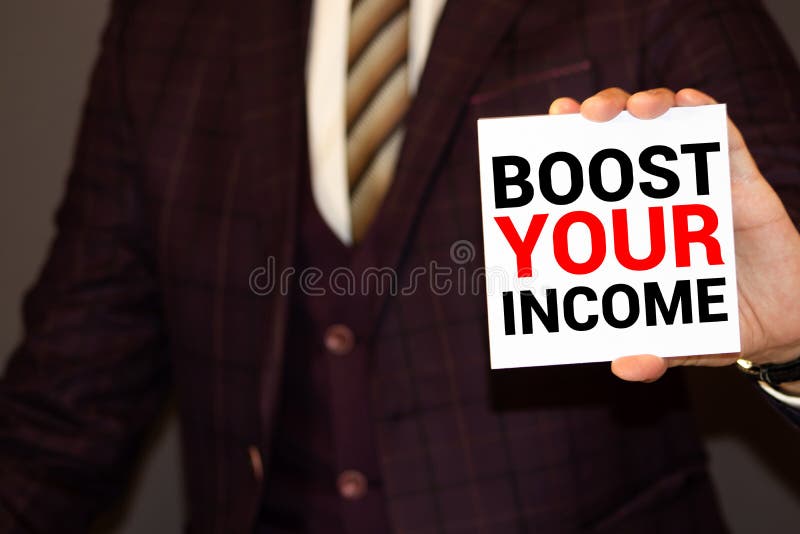 Boost Your Income. Man Holding a Card with a Message Text Written on it ...