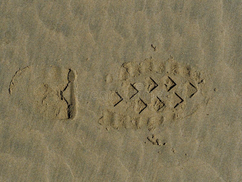 Boot print in brown mud stock photo. Image of sport, symbol - 4903954