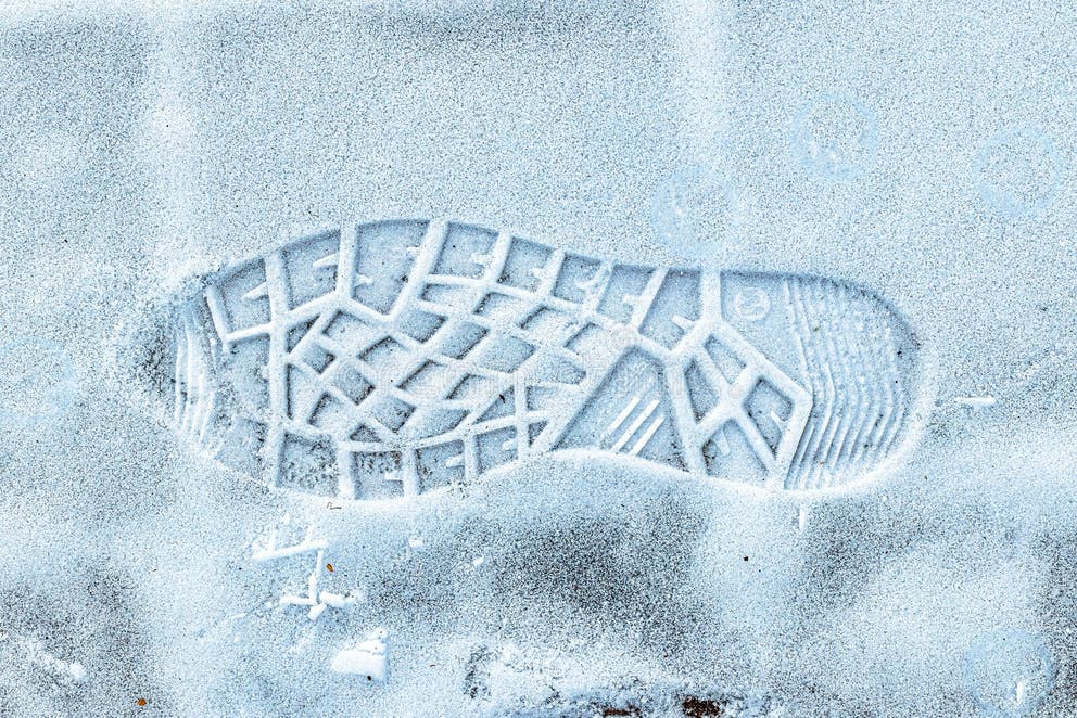 Boot Track on Thin First Snow in Winter. Stock Photo - Image of white ...