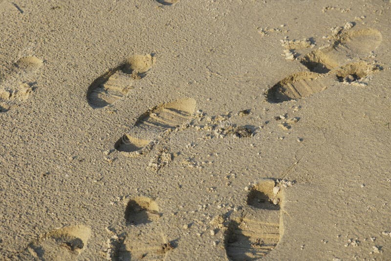 Boot Tracks Towards Success In Snow Stock Photo - Image of written ...
