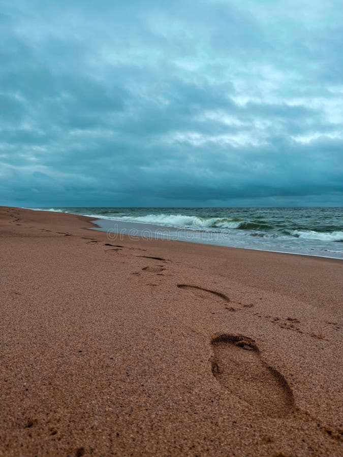 Boot Tracks on the Sand with the Waves View Touching the Beach Line ...