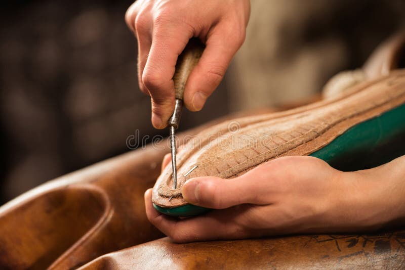 Bootmaker Sitting in Workshop Making Shoes Stock Photo - Image of ...