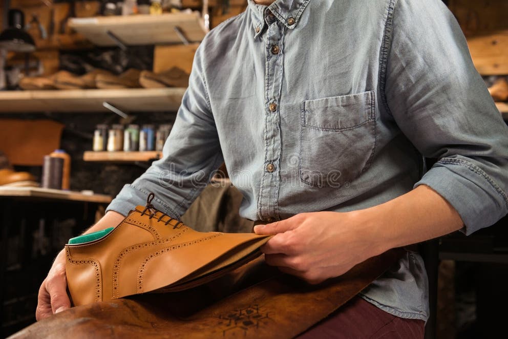 Bootmaker Sitting in Workshop Making Shoes Stock Photo - Image of ...