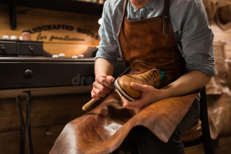 Shoemaker Sitting in Workshop Making Shoes Stock Photo - Image of ...