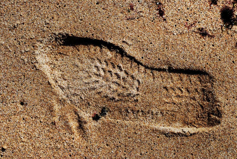 Boot print in brown mud stock photo. Image of sport, symbol - 4903954