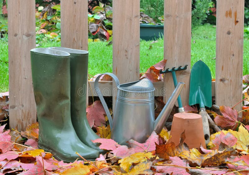 Boots and Gardening Tools Fall Stock Photo - Image of watering, scene ...