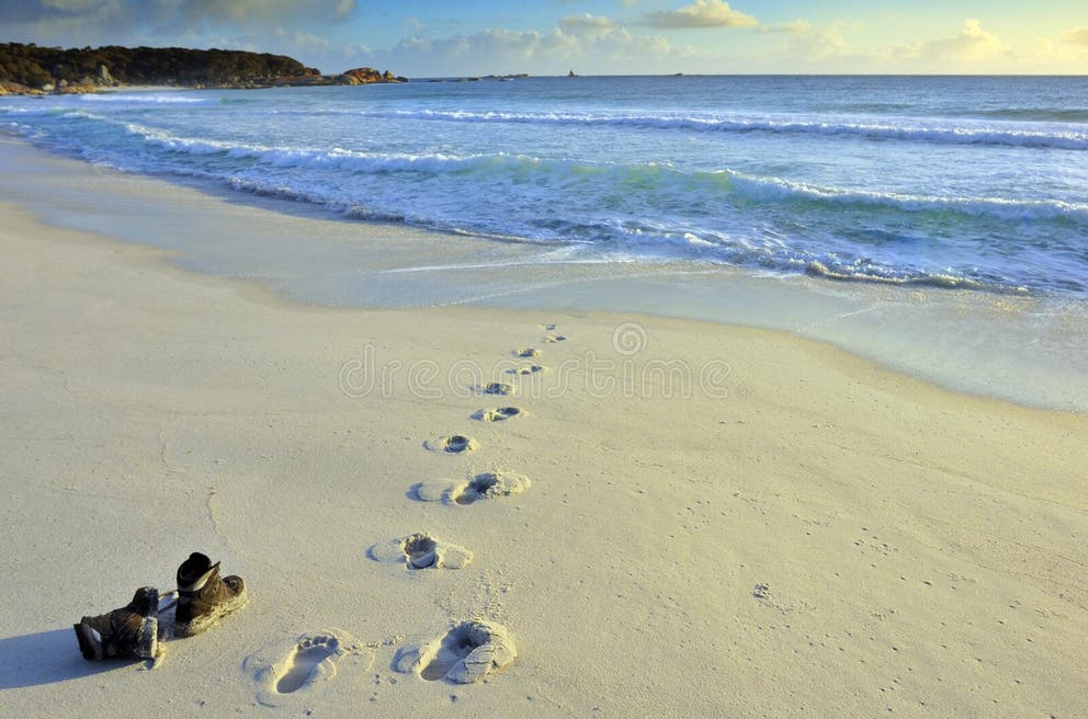 Boots left on the beach stock photo. Image of foam, breaker - 5645376