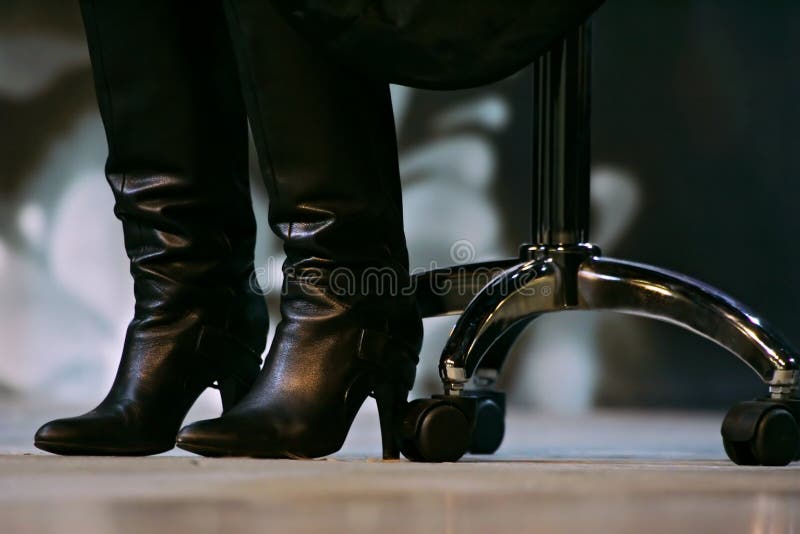Boots and office chair stock photo. Image of office, opposition - 45415846