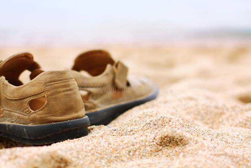 Shoes in the Sand stock image. Image of shells, monochrome - 1047303