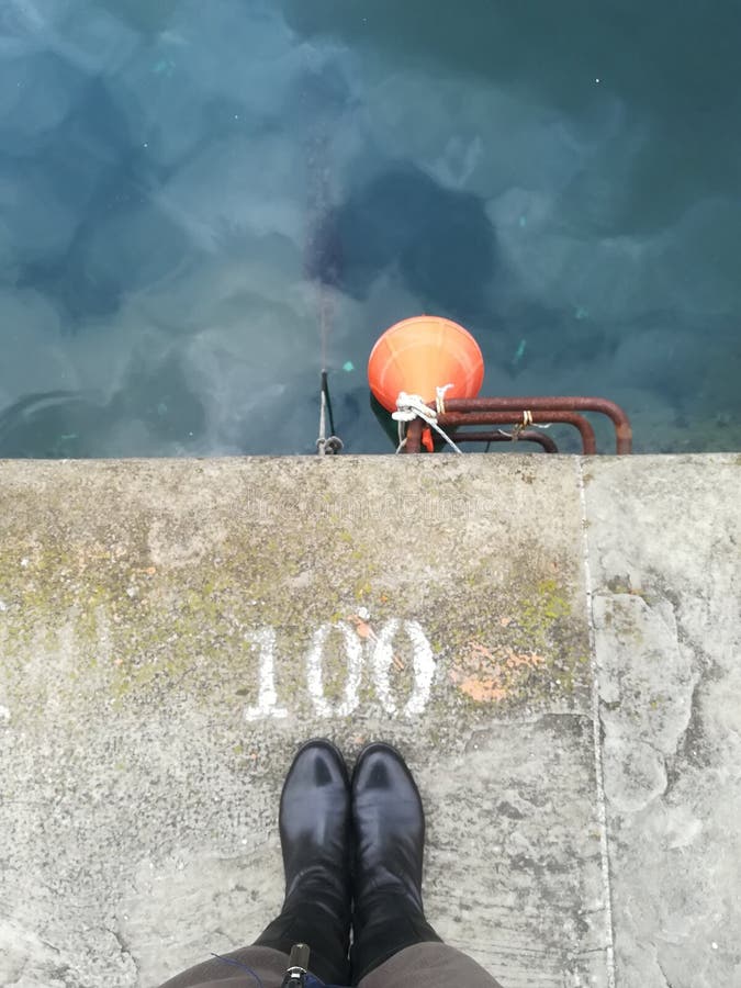 The boots and the sea stock photo. Image of docks, sailing - 134087798