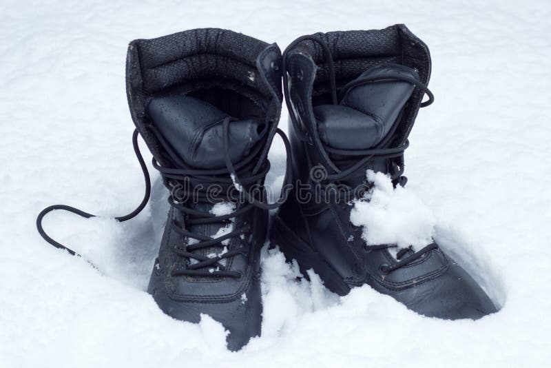 Boots in the snow stock photo. Image of white, sport - 28992726