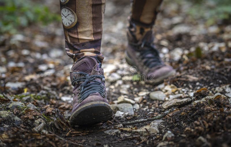 Boots walking on the path stock image. Image of land - 142130445