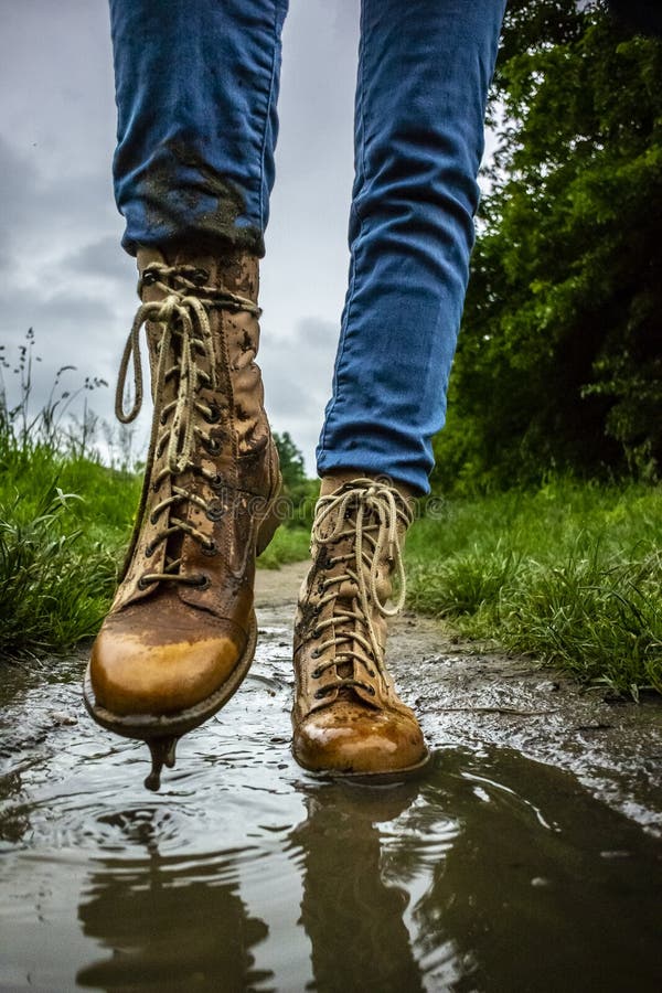 Boots is Walking in a Puddle Stock Photo - Image of jump, boots: 186211046