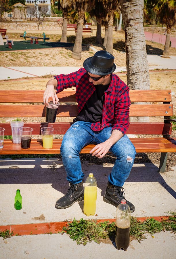 Drunk on park bench stock photo. Image of booze, alcohol - 34763134