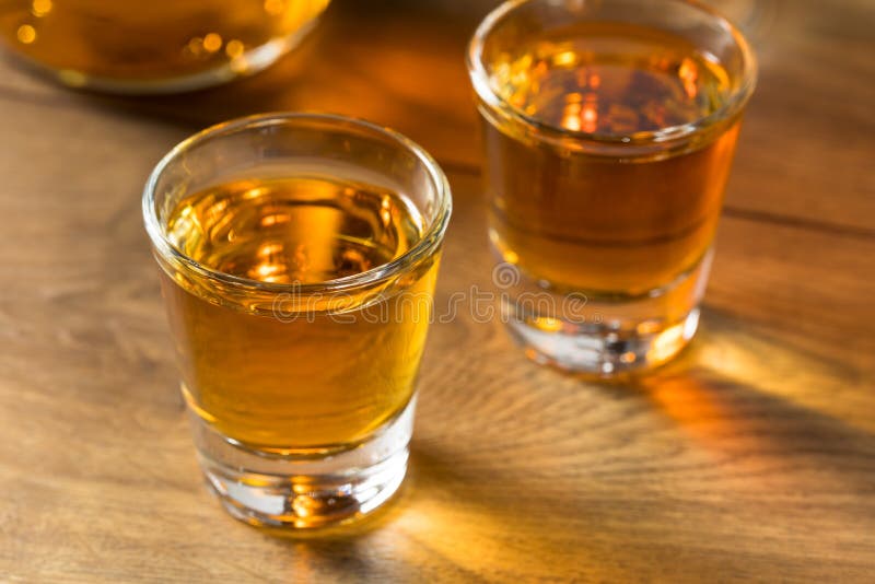 Boozy Alcoholic Rum Shots stock image. Image of glass - 187555405