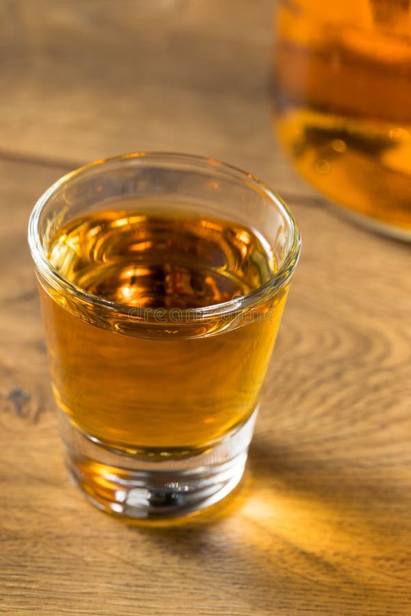 Boozy Alcoholic Rum Shots stock photo. Image of drink - 187555530