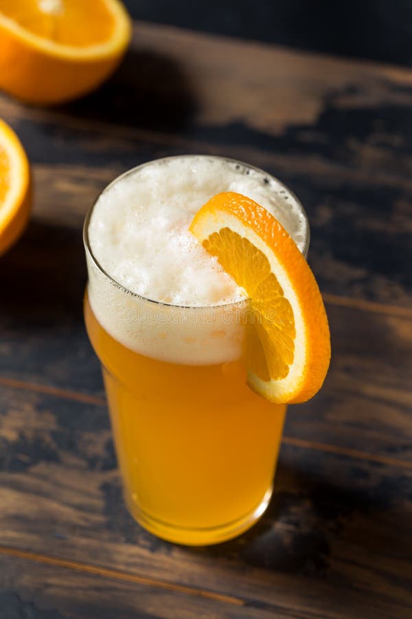 Boozy Belgian Orange Wheat Beer Stock Photo - Image of liquid, wheat ...