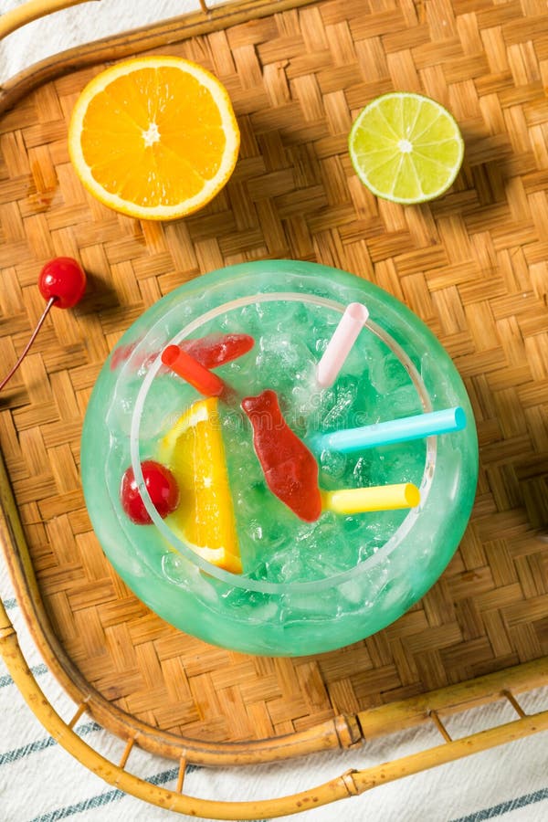 Boozy Cold Blue Tiki Fishbowl Cocktail Stock Photo - Image of orange ...