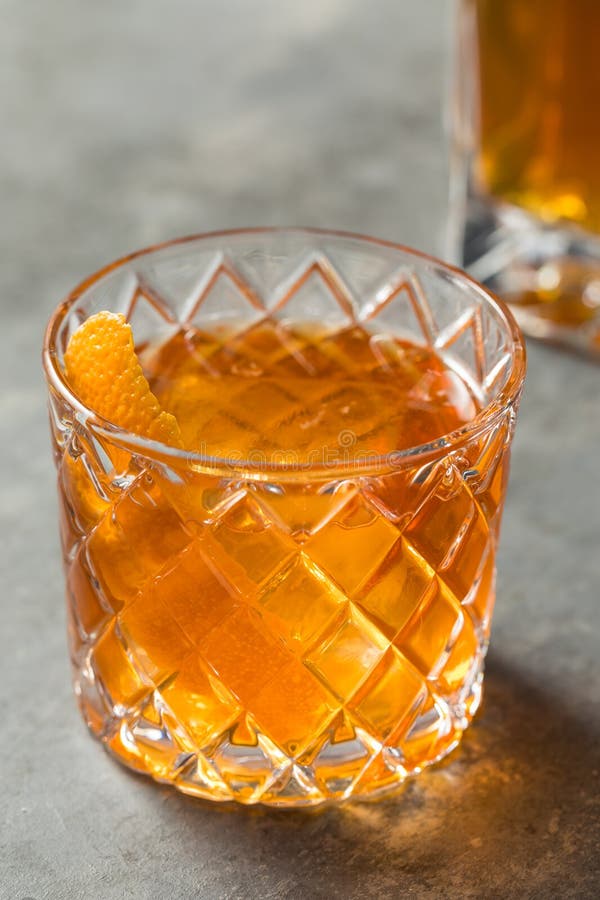 Boozy Cold Bourbon Old Fashioned Cocktail Stock Photo - Image of liquid ...