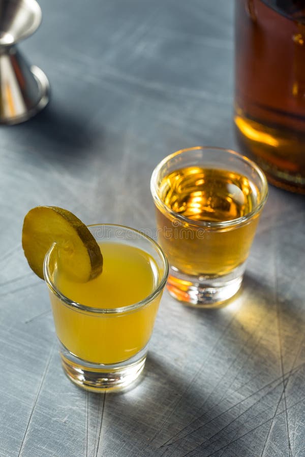 Boozy Cold Pickleback Shot Cocktail Stock Image - Image of saline, sour ...