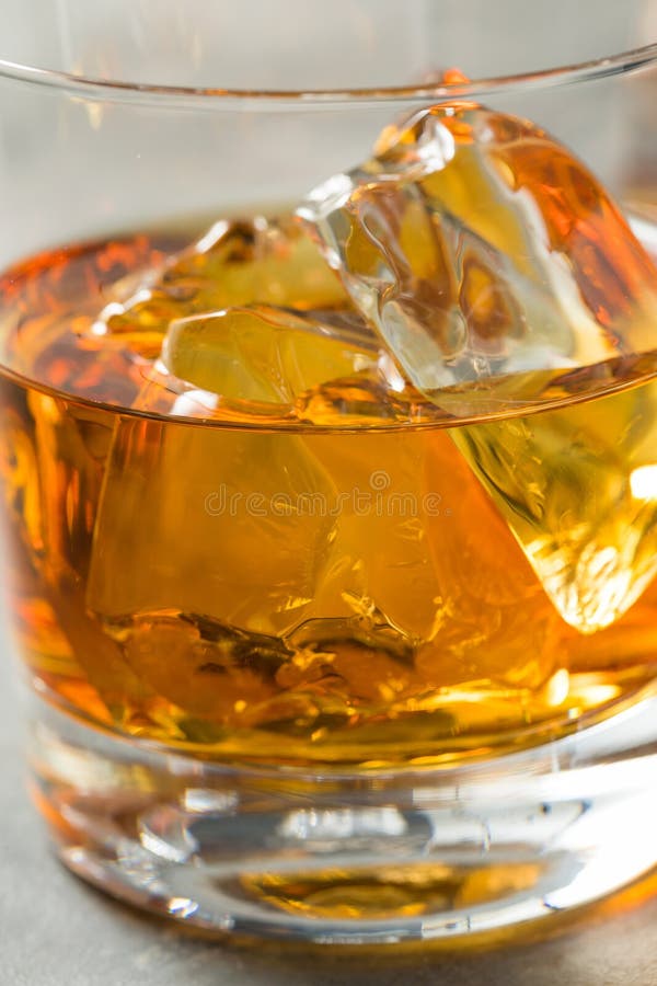 Boozy Refreshing Bourbon Whiskey on the Rocks Stock Image - Image of ...