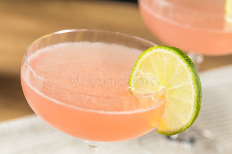 Boozy Refreshing Pink Cosmopolitan Cocktail Stock Photo - Image of pink ...