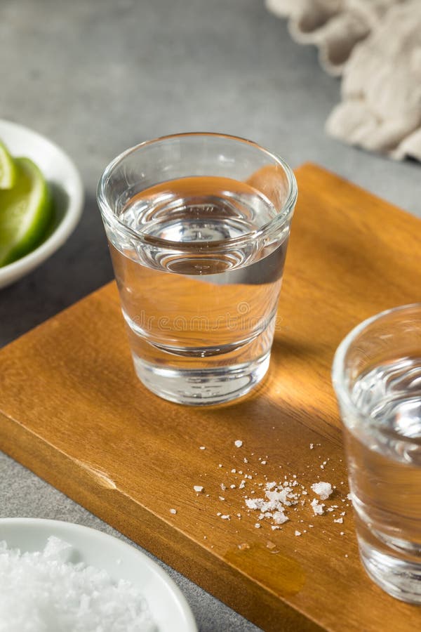 Boozy Refreshing Tequila Shots Stock Photo - Image of lime, shots ...