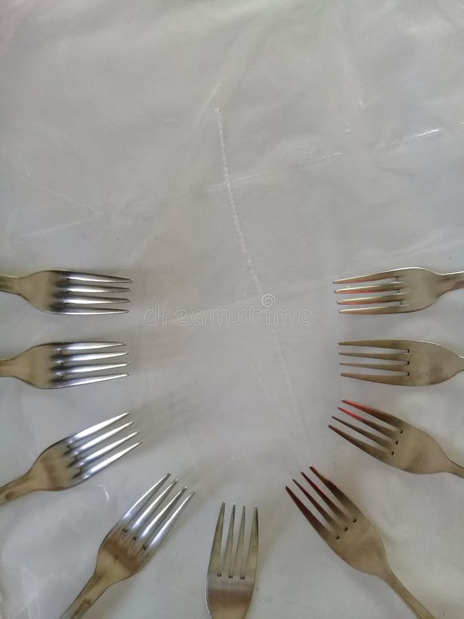 Border of forks on slate stock photo. Image of slate - 119029800