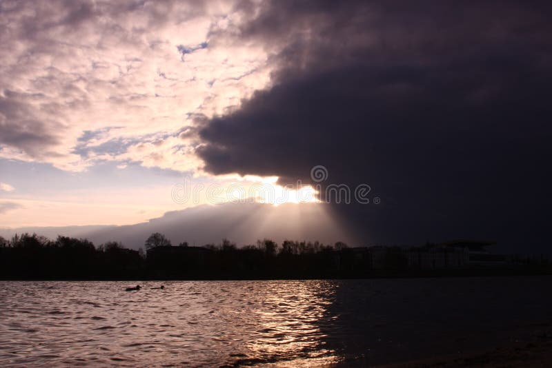 Ruby Sunset Over Ocean ~ Sun Beams Stock Image - Image of coast, fall ...