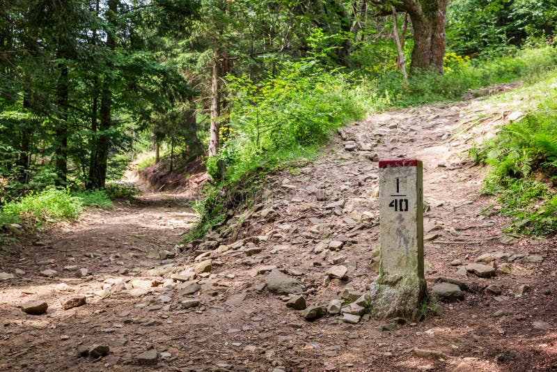 Border Post on Mountain Trail Stock Photo - Image of leisure, peak ...