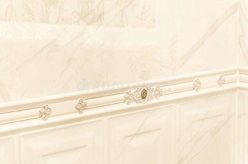 Border Wall Ceramic Tiles. Marble Tile on Wall Divided by a Narrow ...