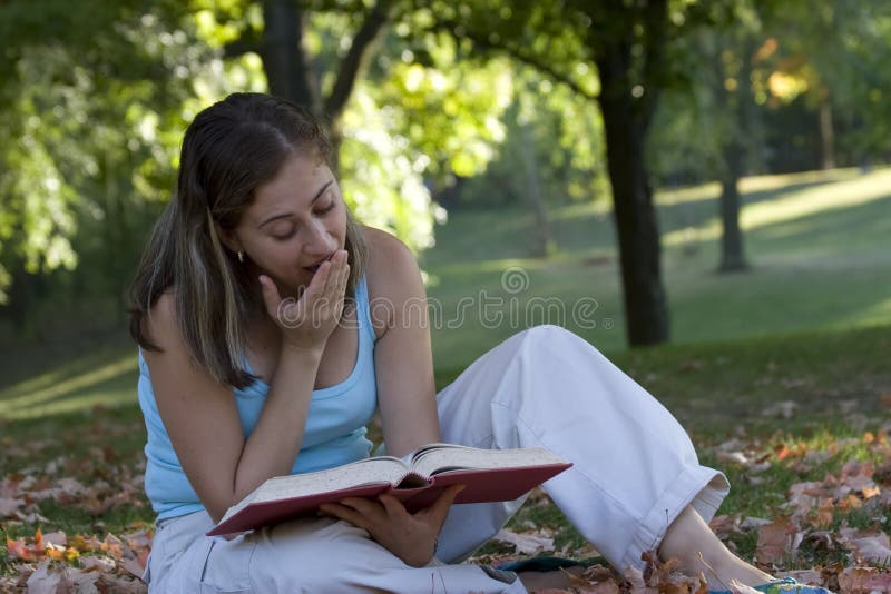 Bored with Book stock photo. Image of leaf, relaxing, females - 3235612