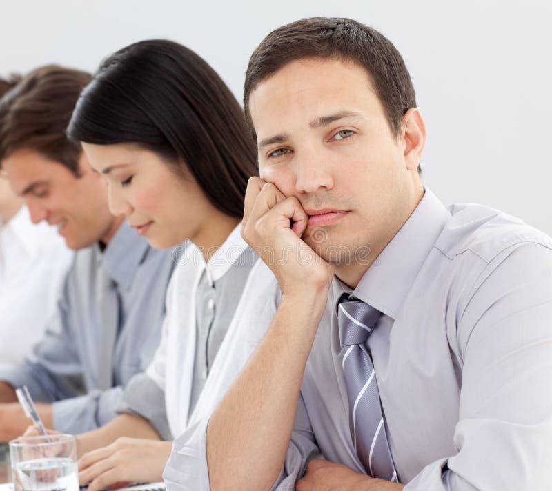 Bored Businessman in a Meeting Stock Photo - Image of multi, learning ...