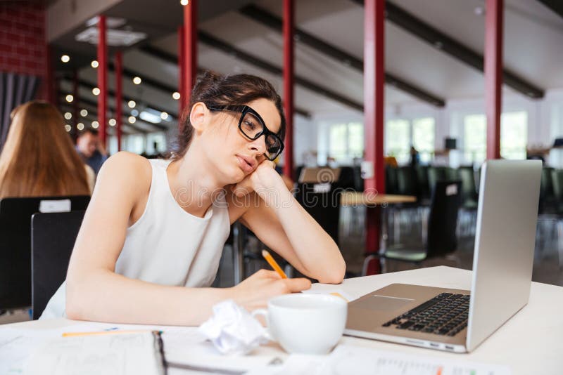 Bored Businesswoman Working Using Laptop in Office Stock Photo - Image ...