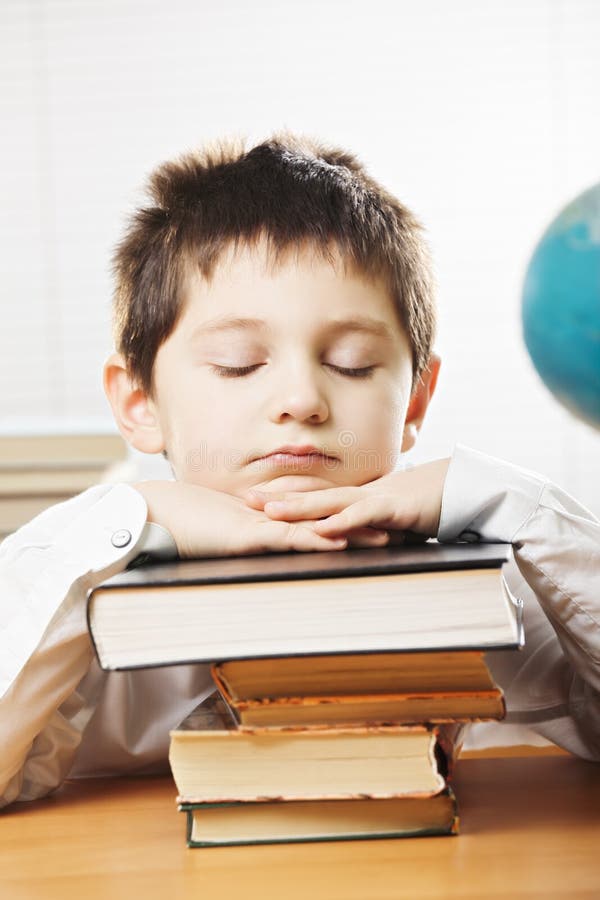 Bored Caucasian Boy In Classroom Stock Photo - Image of vertical ...