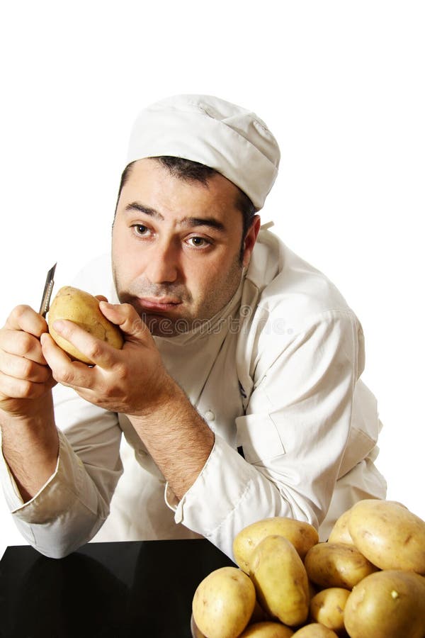 Bored Chef Peeling Potatoes Stock Photo - Image of kitchen, clothes ...