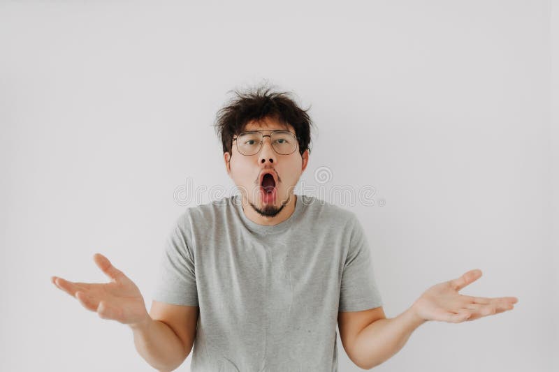 Bored Face Man Presenting Advertisement with Shocked Mouth Isolated on White. Stock Photo ...