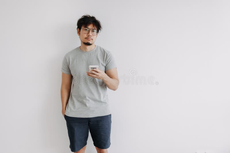 Bored Face Man Using Mobile Phone App Boringly Isolated on White. Stock ...